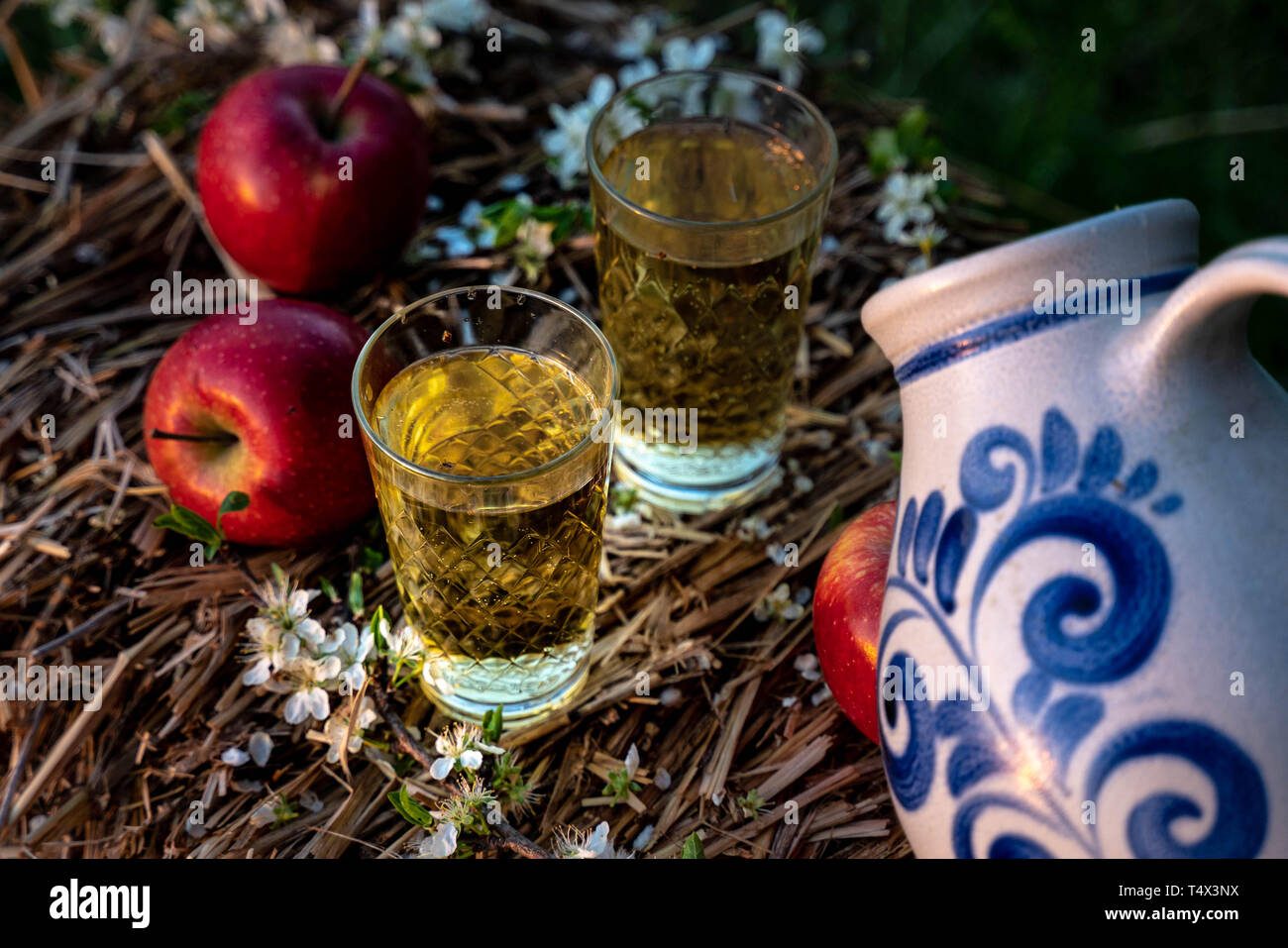 Traditional German Apple Wine from the Hesse Region. Wine in an old jug ...
