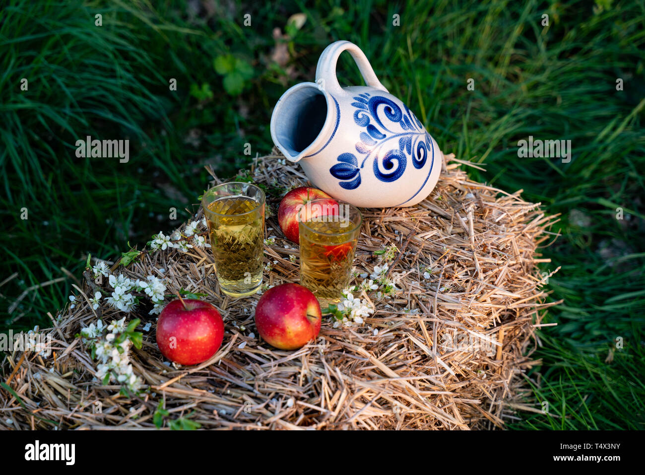 Traditional German Apple Wine from the Hesse Region. Wine in an old jug ...