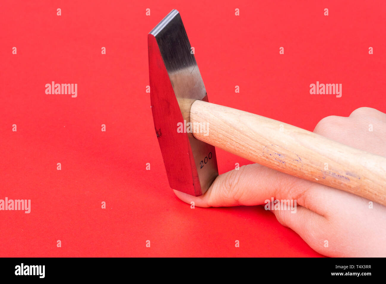 Hit finger with hammer hi-res stock photography and images - Alamy
