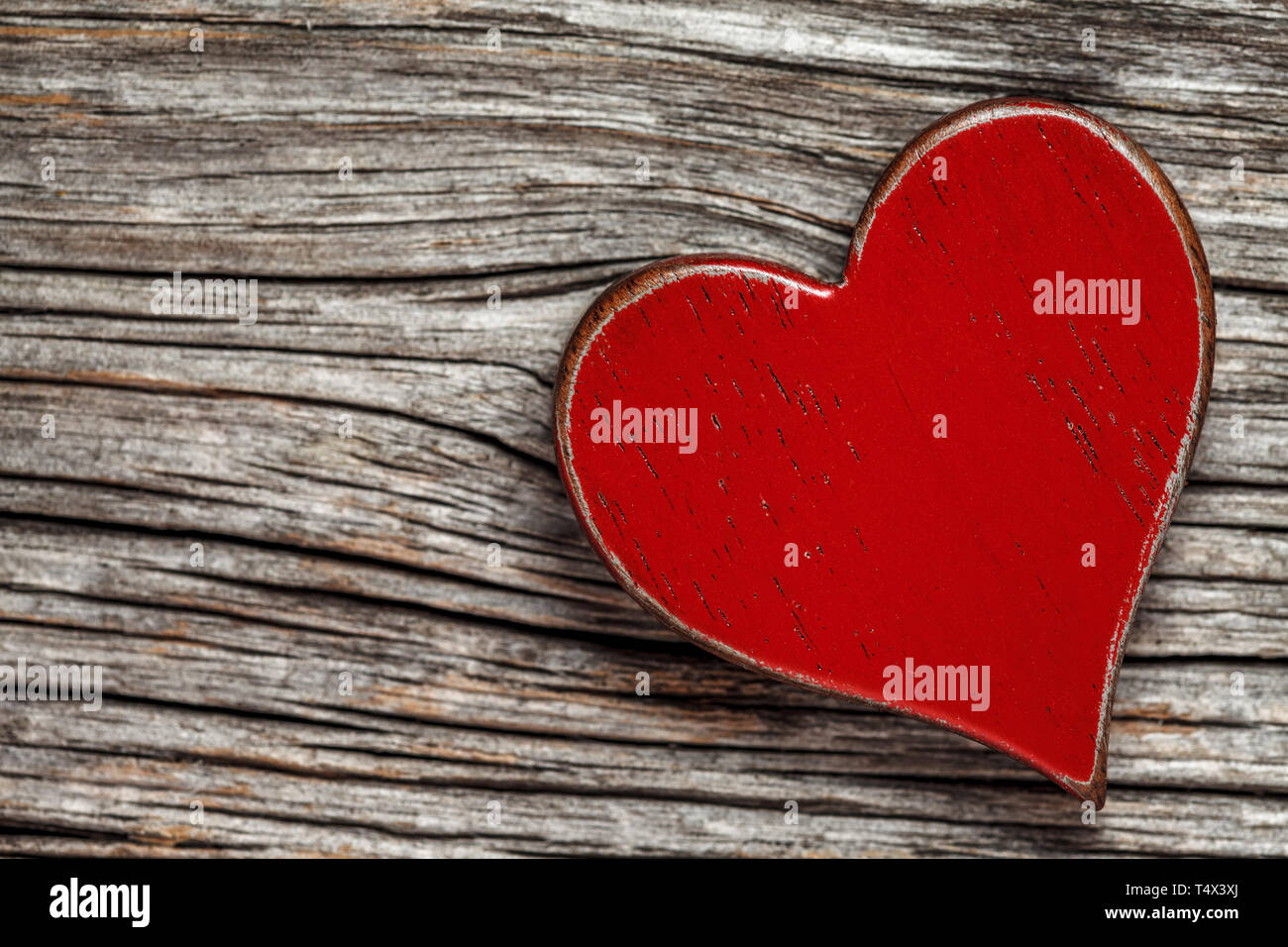 Bright Red Rustic Red heart Stock Photo - Alamy