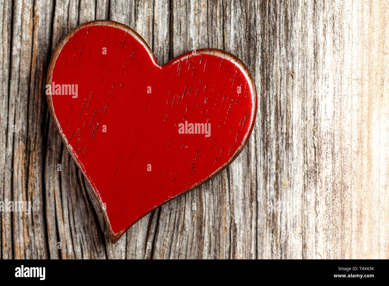 Bright Red Rustic Red heart Stock Photo - Alamy