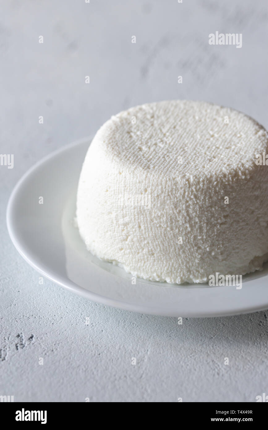 Ricotta - Italian whey cheese on white background Stock Photo - Alamy