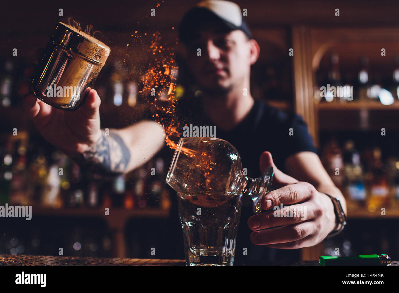 Fire ice cocktail with mint and cinnamon Stock Photo - Alamy
