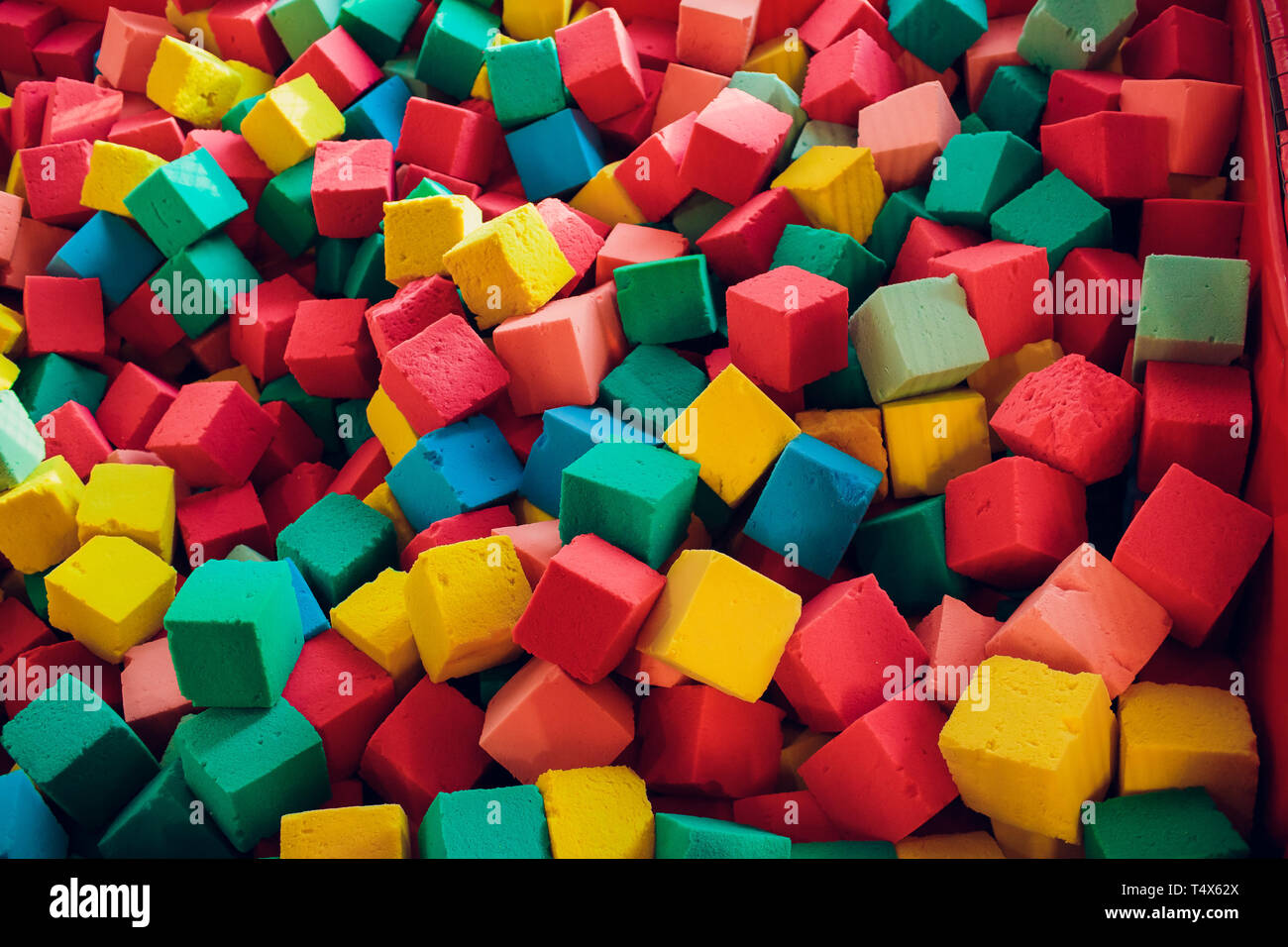Many colorful soft blocks in a kids' pool at a playground. Bright multi ... Many colorful soft blocks in a kids' pool at a playground. Bright multi ...