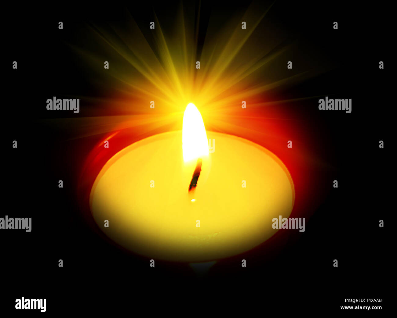 candle burning bright in the dark Stock Photo - Alamy
