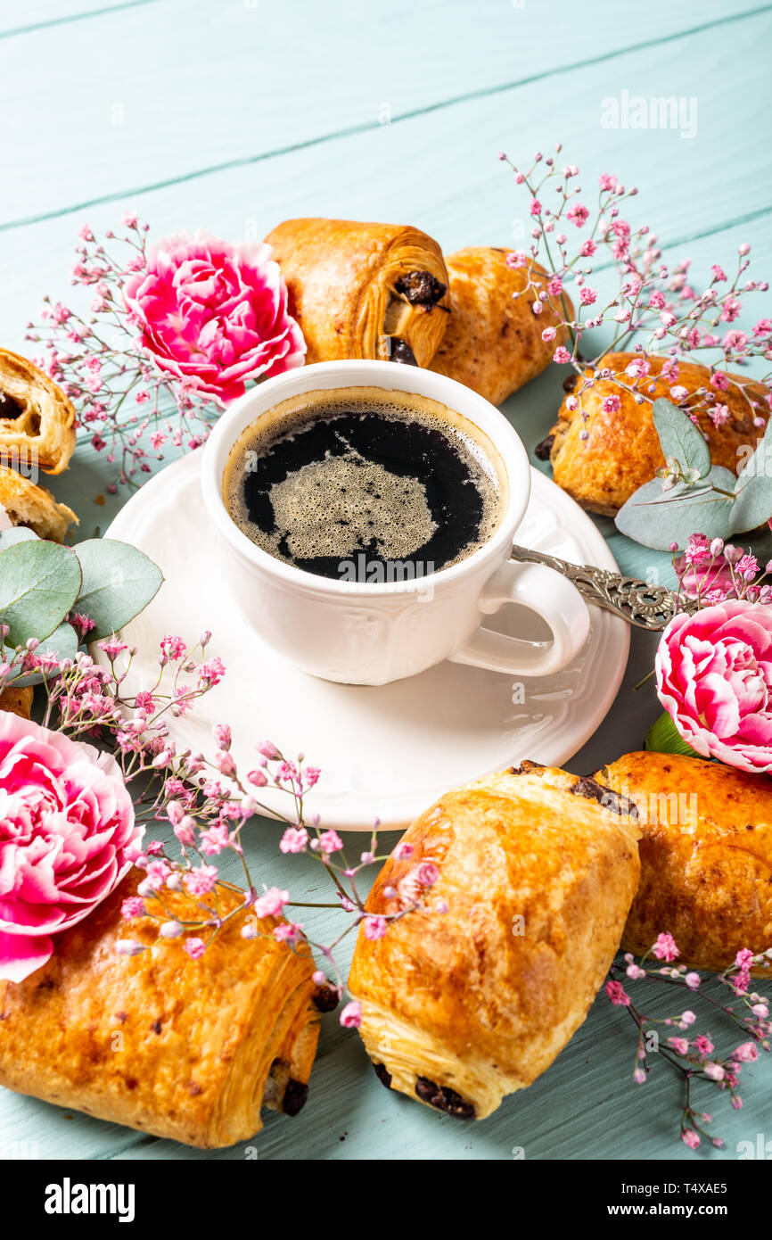 Breakfast with mini fresh croissants bun with chocolate and coffee cup Stock Photo - Alamy