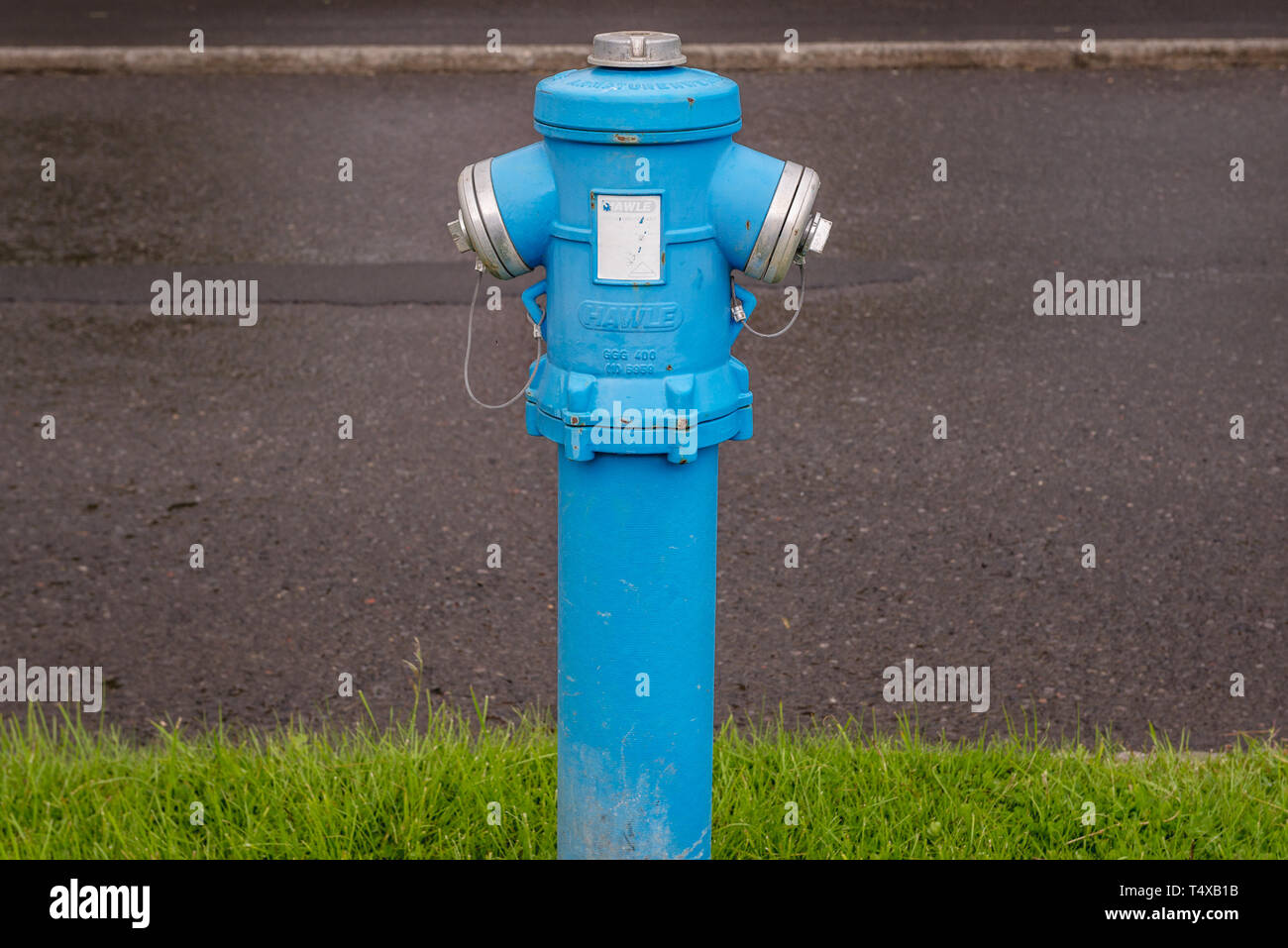 Blue fire hydrant in Akureyri city, Capital of North Iceland Stock ...
