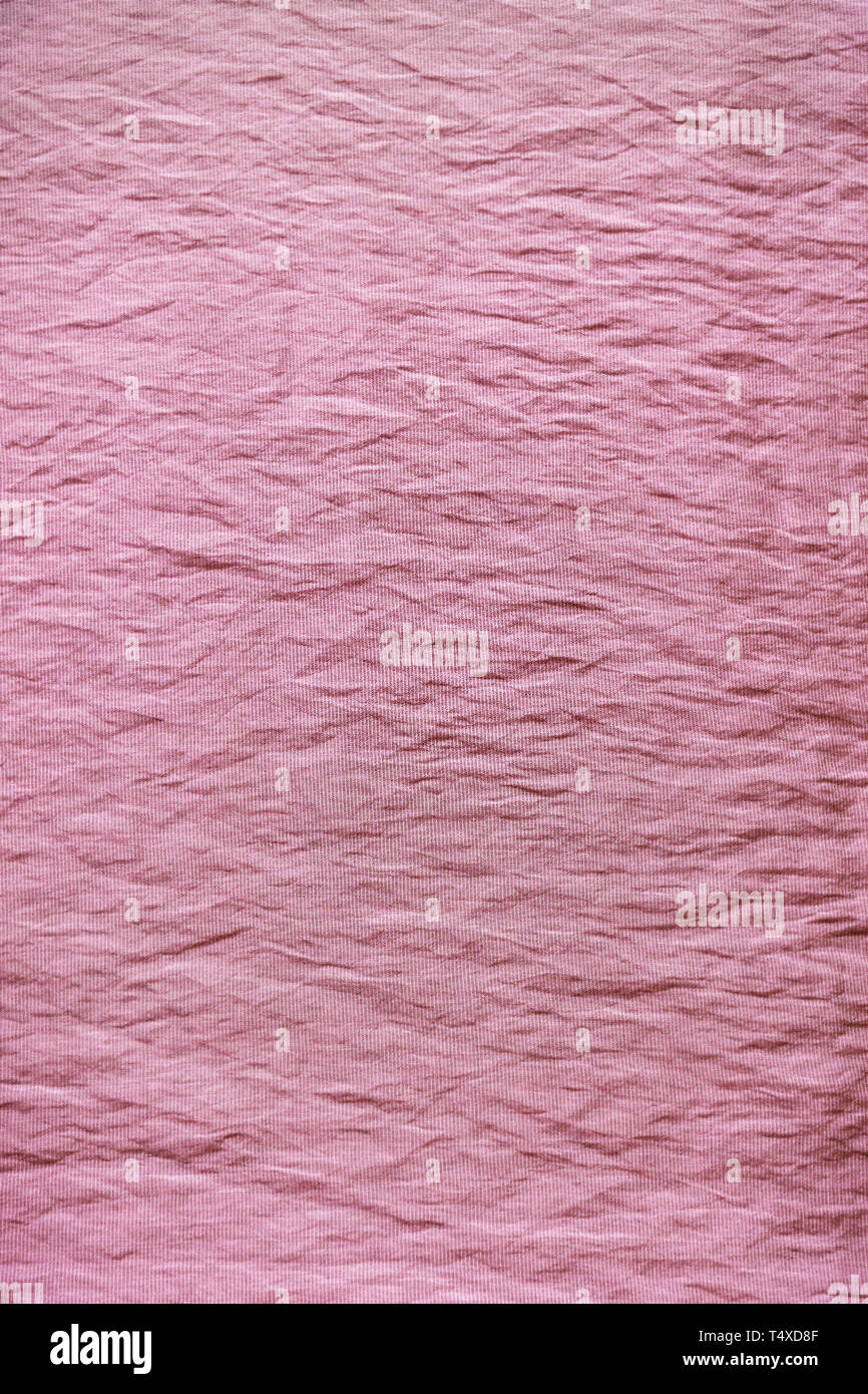 Texture of pink crumpled fabric for background Stock Photo - Alamy