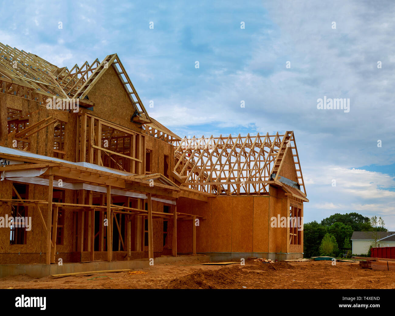 Framing beam of new house unfinished wood frame building Stock Photo ...