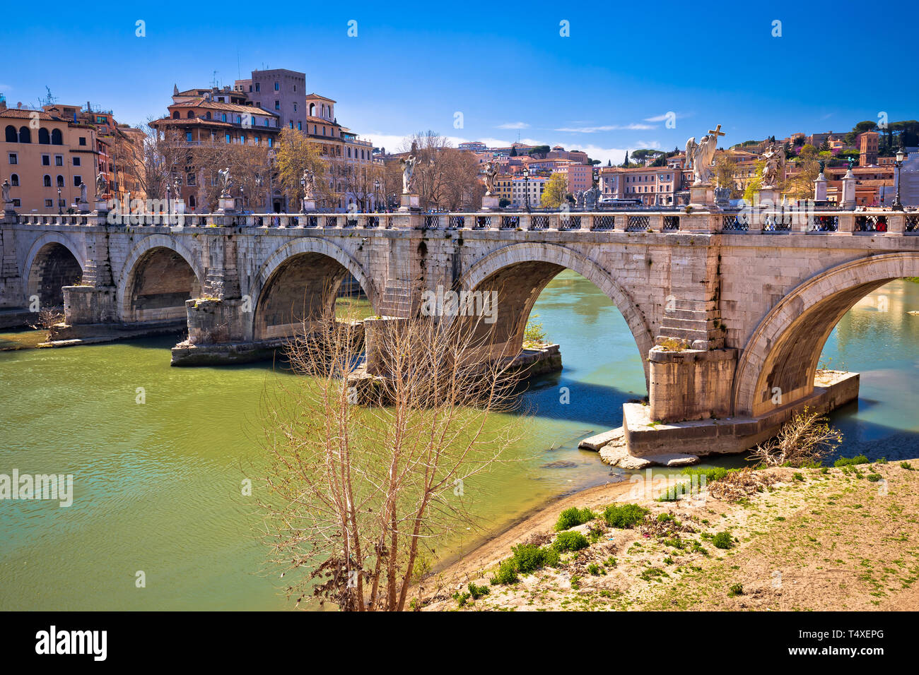 Ancient Ponte Sant Angelo stone bridge on Tiber river of Rome, capital of Italy Stock Photo - Alamy