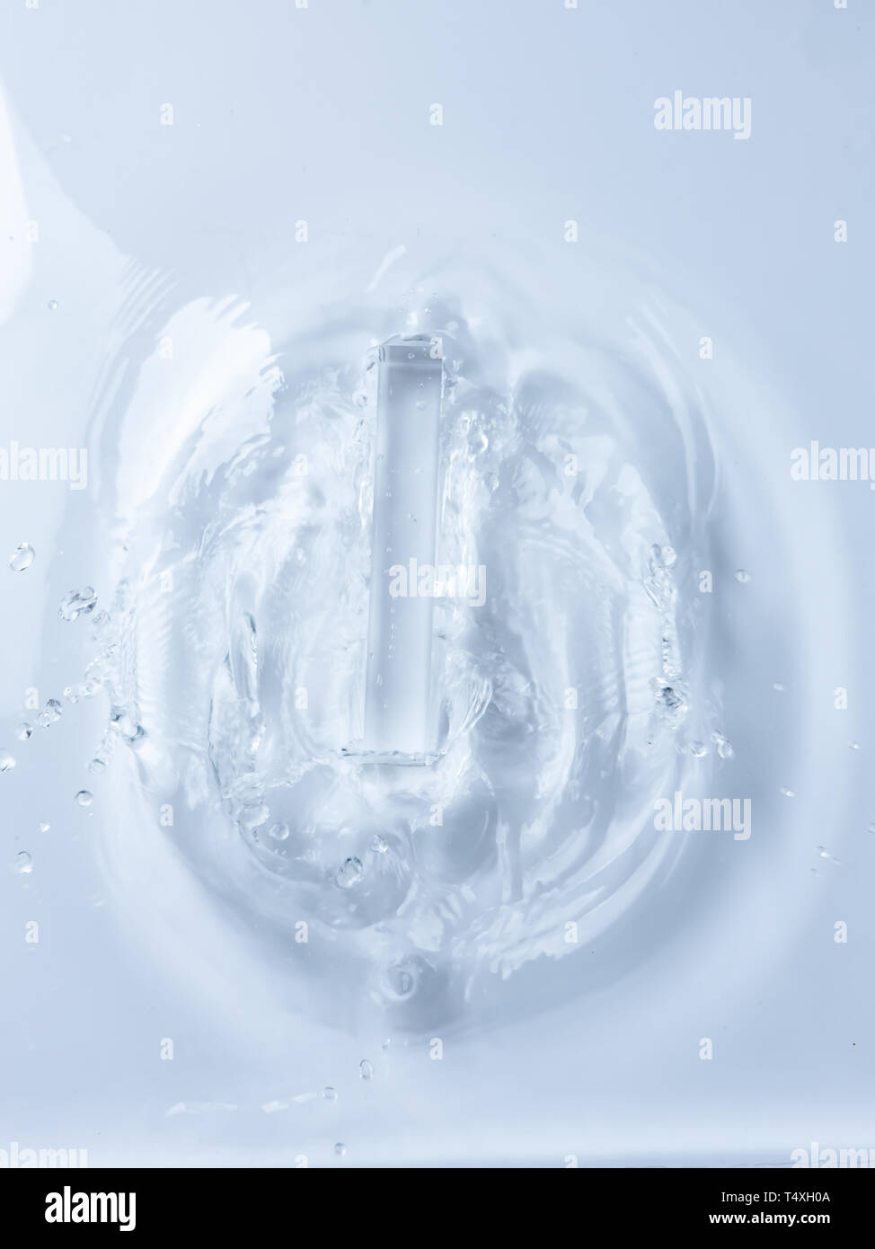 water splash with ripple from top view Stock Photo - Alamy