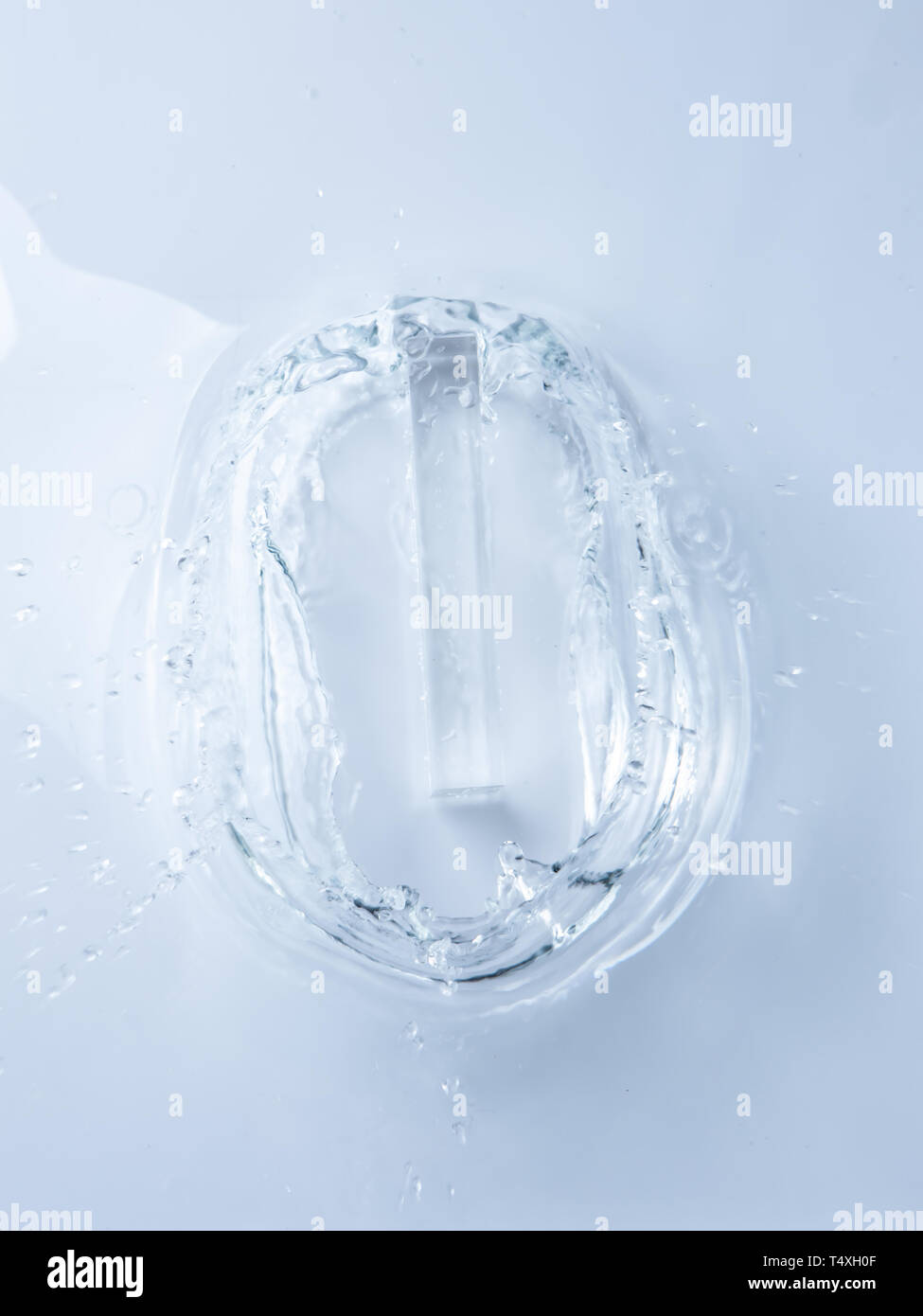 water splash with ripple from top view Stock Photo - Alamy