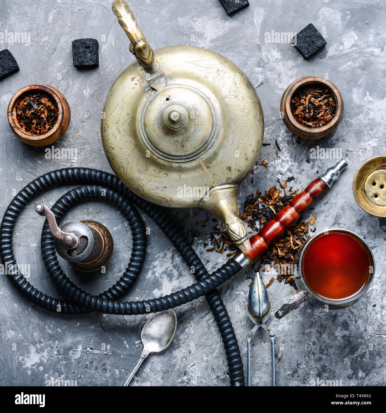East smoking hookah. Arabian shisha with tea. Hookah and tea.Shisha ...