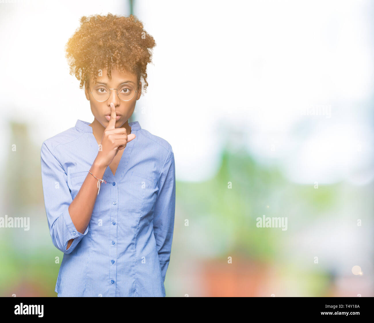 Beautiful young african american business woman over isolated ...