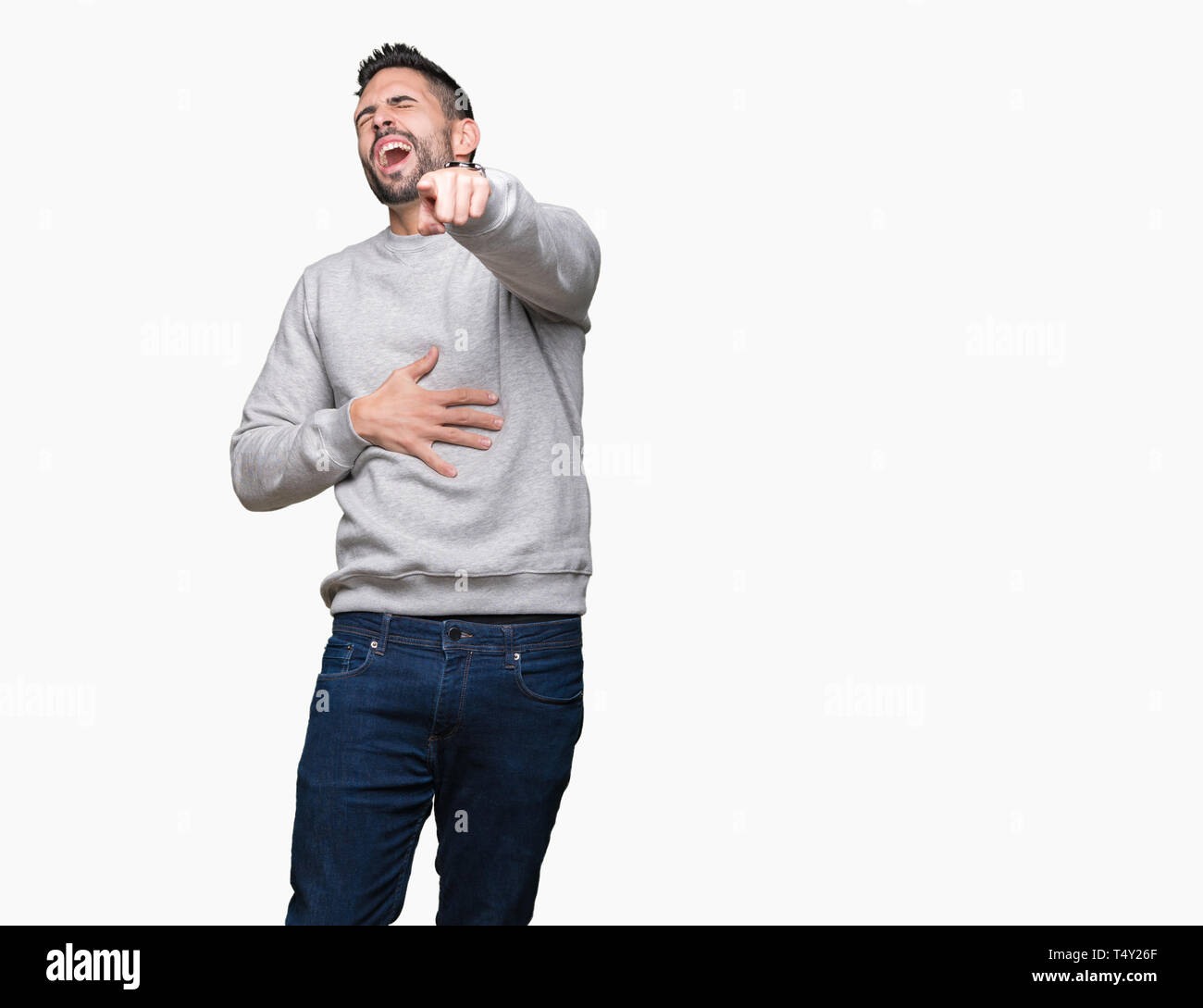 Young handsome man wearing sweatshirt over isolated background Laughing ...