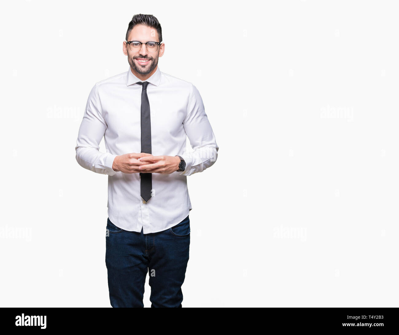 Young handsome business man wearing glasses over isolated background ...