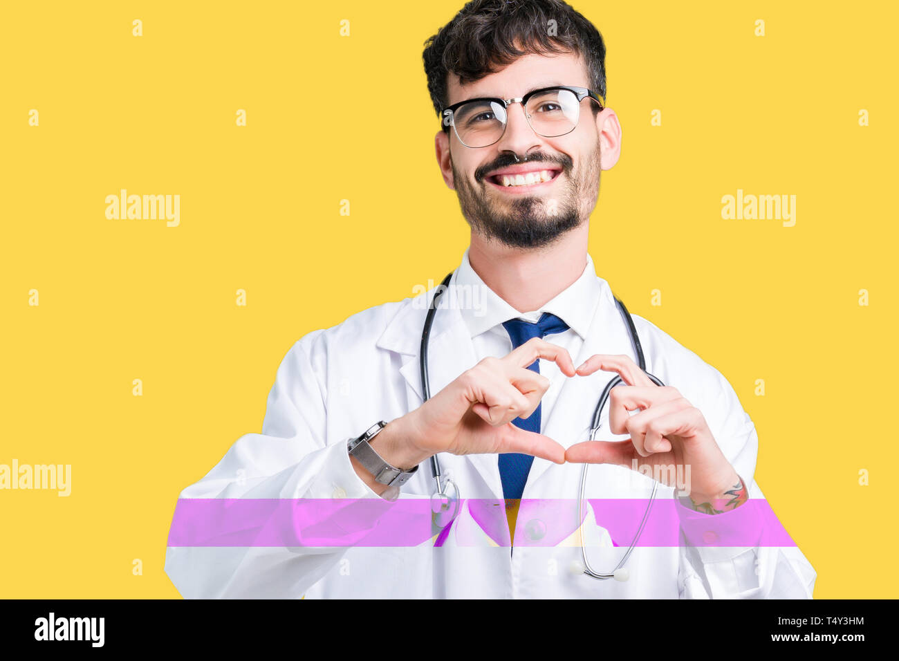Young doctor man wearing hospital coat over isolated background smiling ...