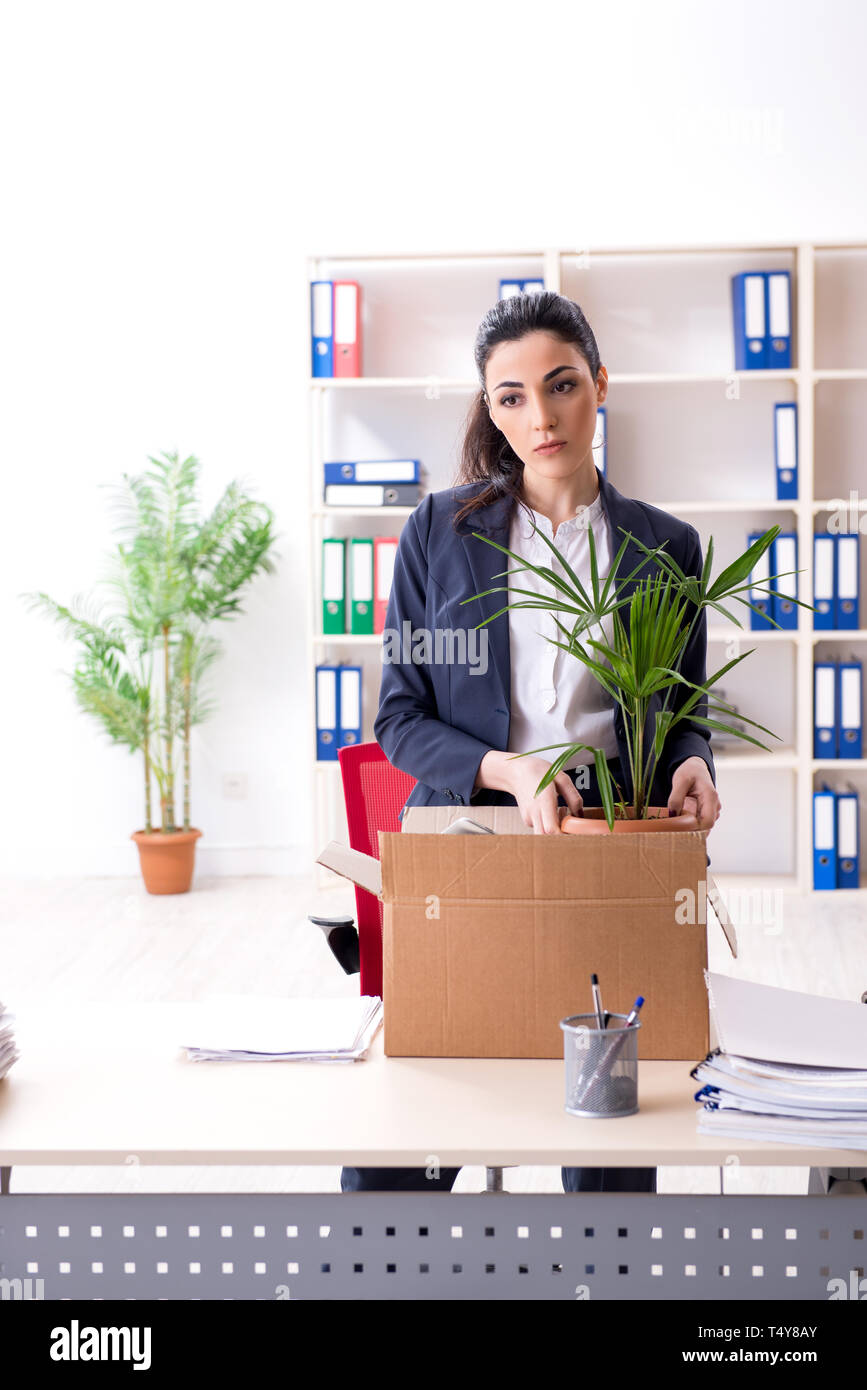 Young female employee being fired from her work Stock Photo - Alamy