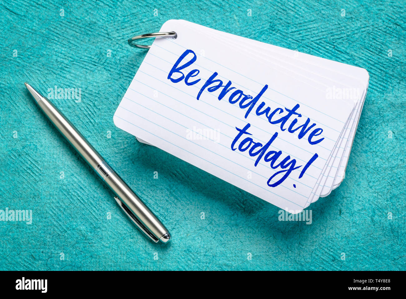 be productive today reminder - handwriting on a stack of index cards ...