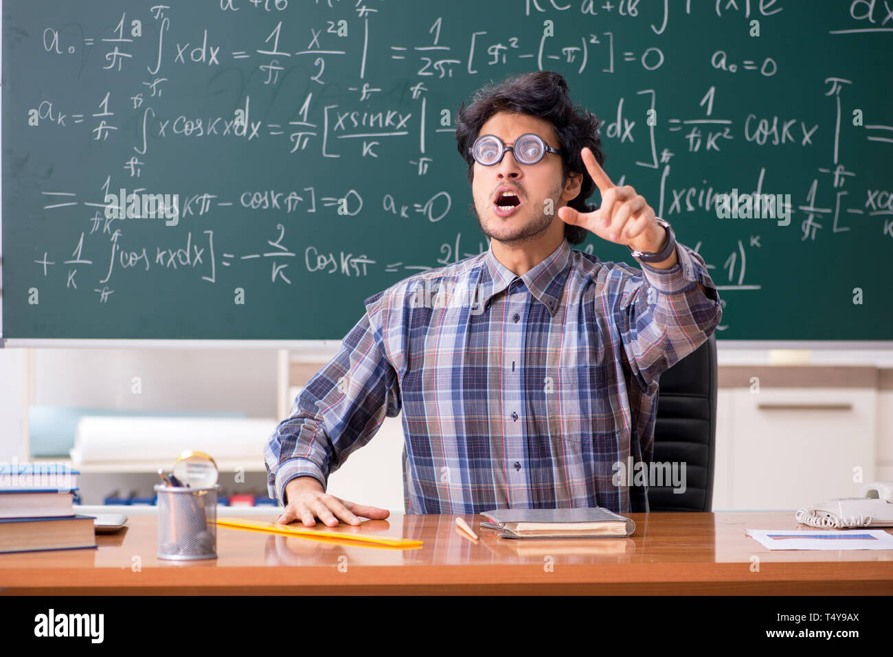 Angry male math teacher hi-res stock photography and images - Alamy