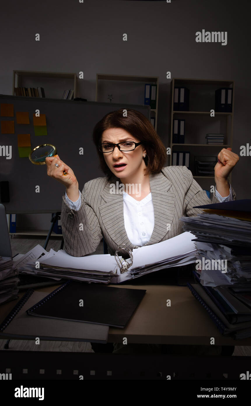 Female employee suffering from excessive work Stock Photo - Alamy