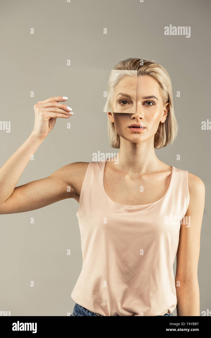 Pleasant beautiful woman thinking about her future Stock Photo - Alamy