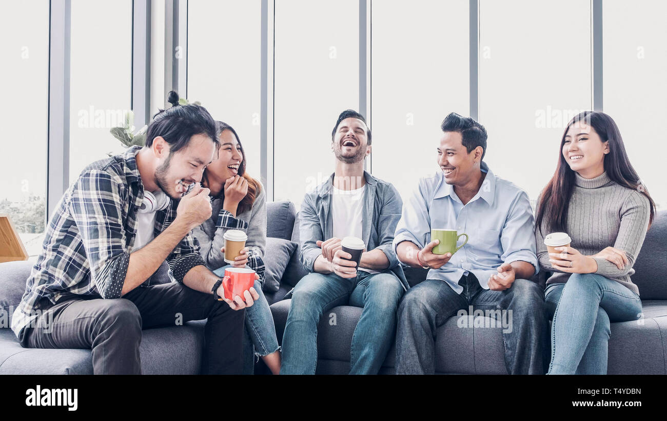creative designer take coffee break at office cafeteria. multiethnics ...