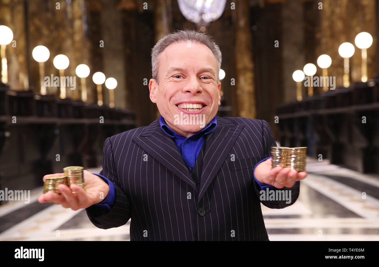 Warwick Davis with James and Oliver Phelps attend the reveal of the ...