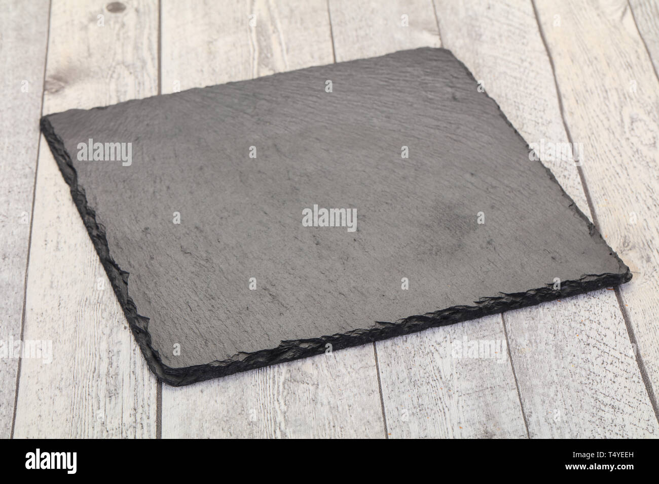 Stone board for serving dishes - kitchenware Stock Photo - Alamy