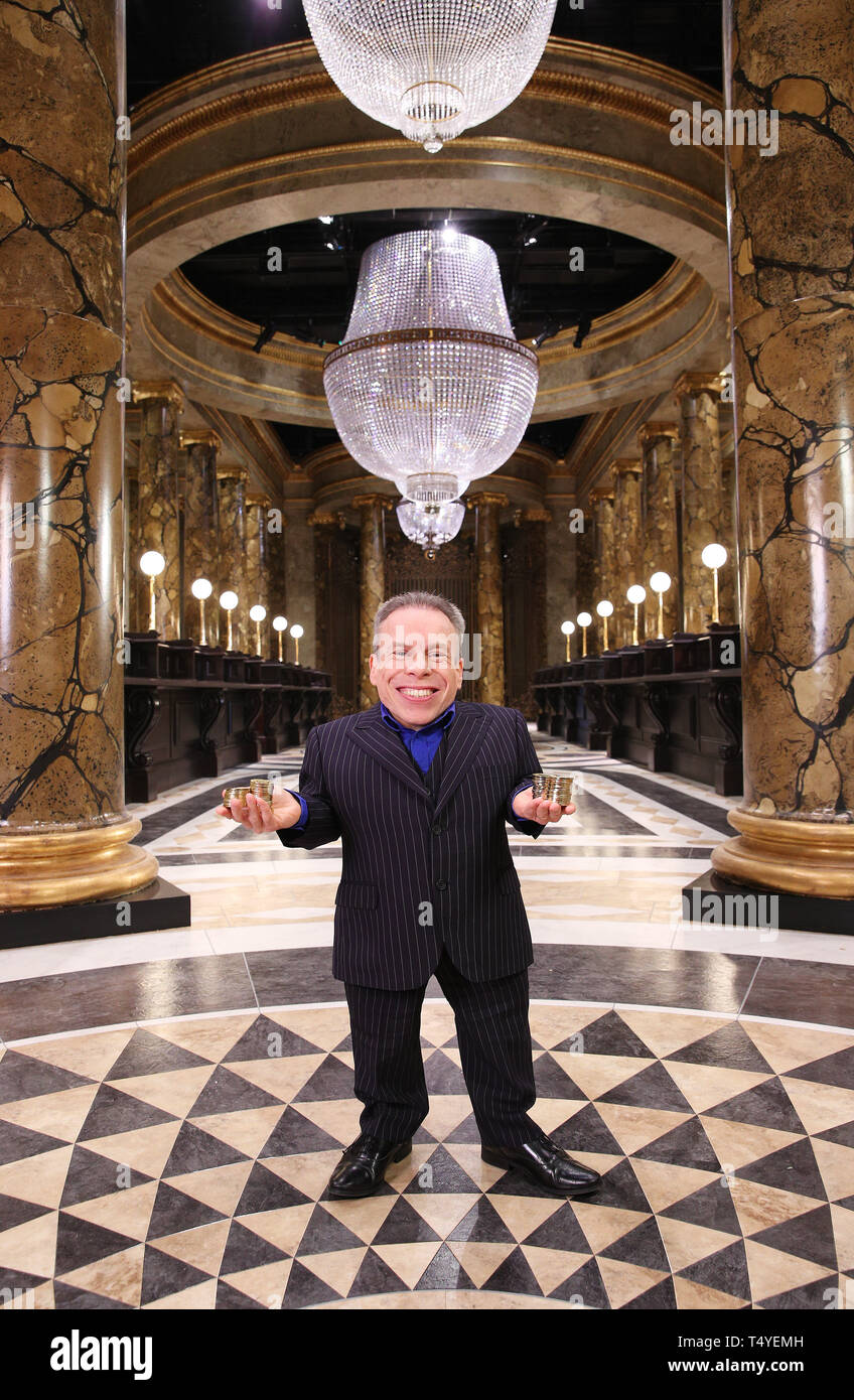 Warwick Davis with James and Oliver Phelps attend the reveal of the ...