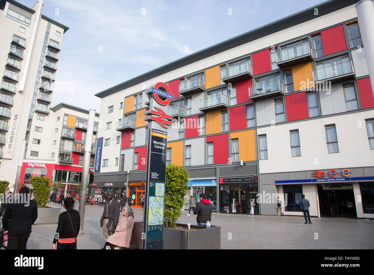 Wembley Central Station entrance on High Road, Wembley busy with ...