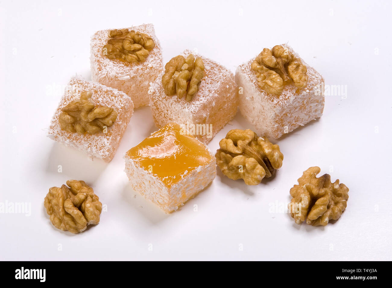 Turkish delight with walnut isolated on white background Stock Photo ...