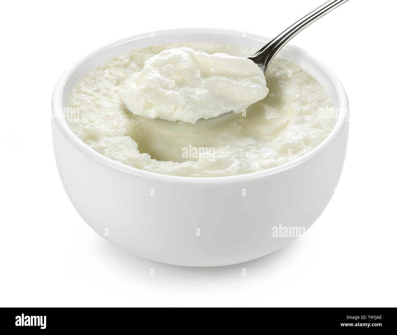 Yogurt with spoon in a bowl isolated on white background Stock Photo ...