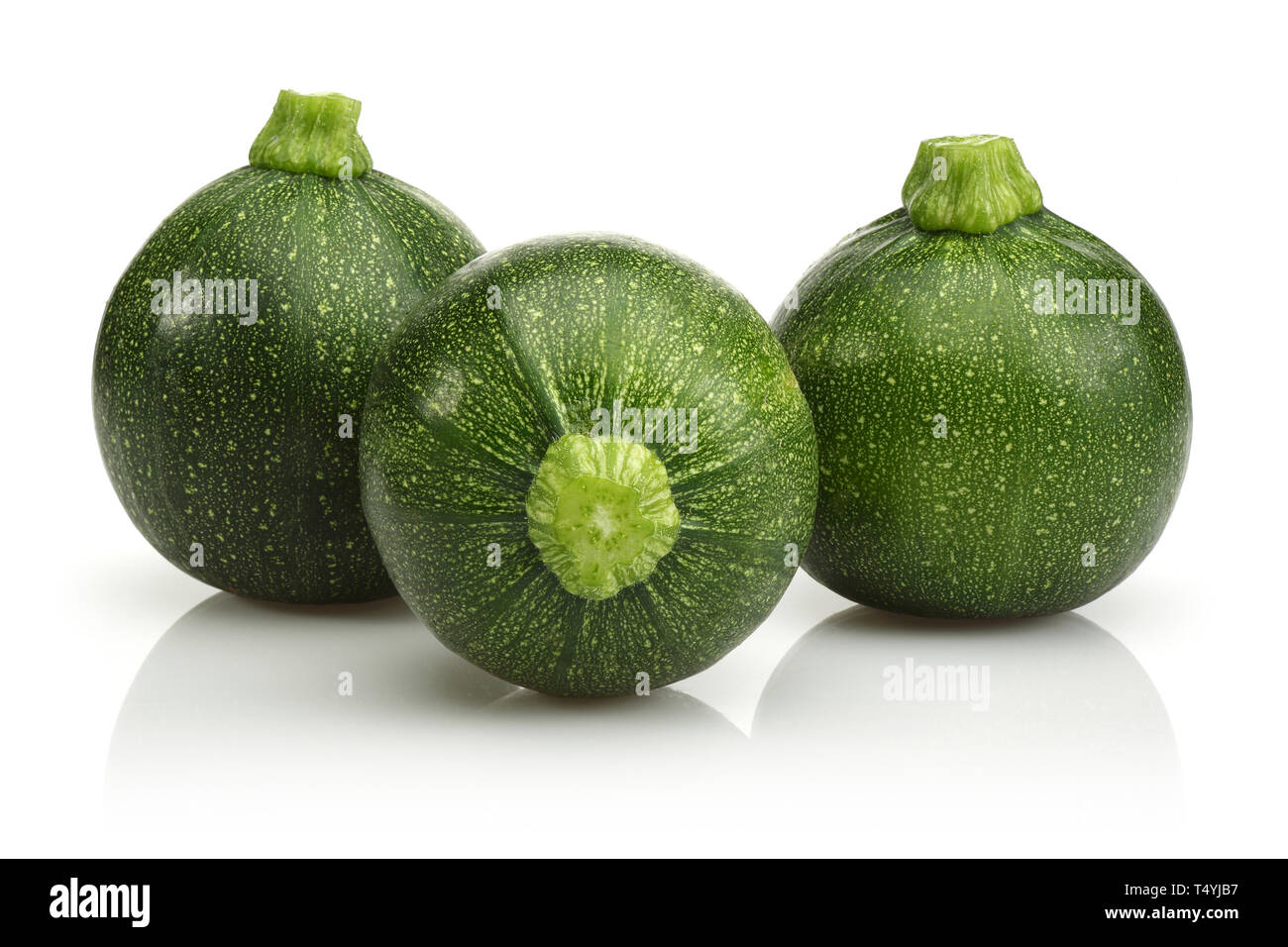 Green round zucchini isolated on white background Stock Photo - Alamy