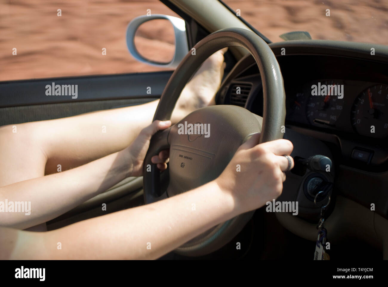Summer fun driving barefoot driving hi-res stock photography and images ...