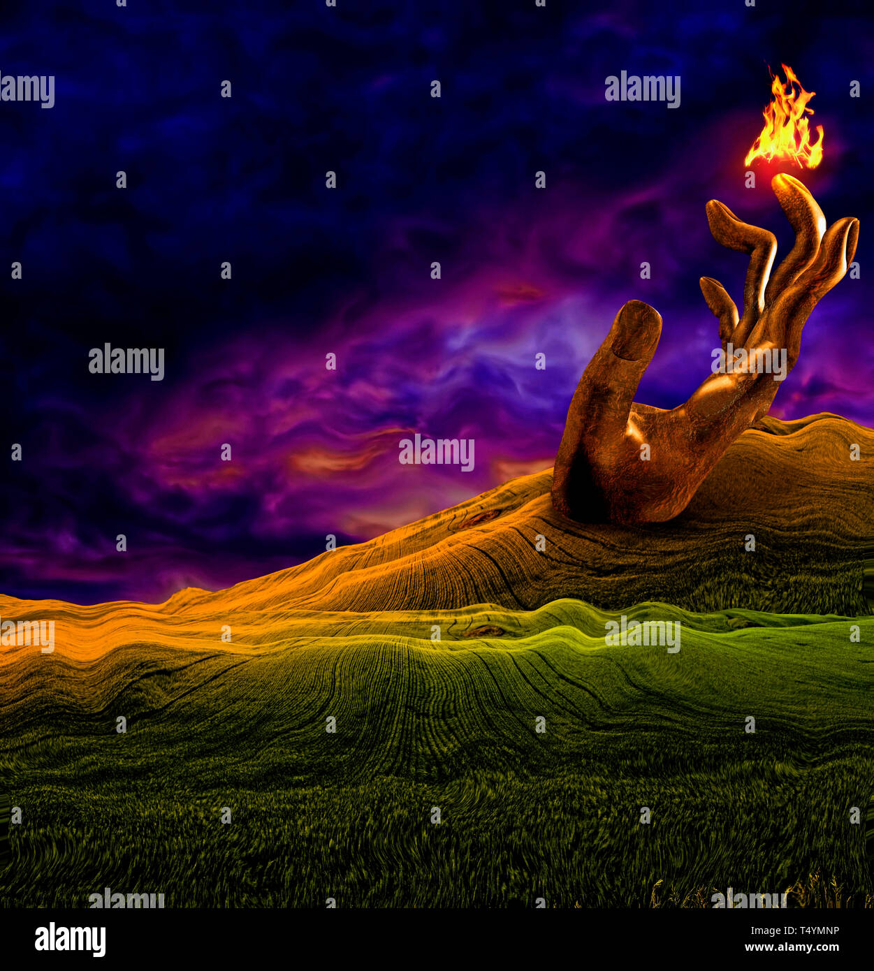 Surreal art. Giant hand in green field makes fire Stock Photo - Alamy