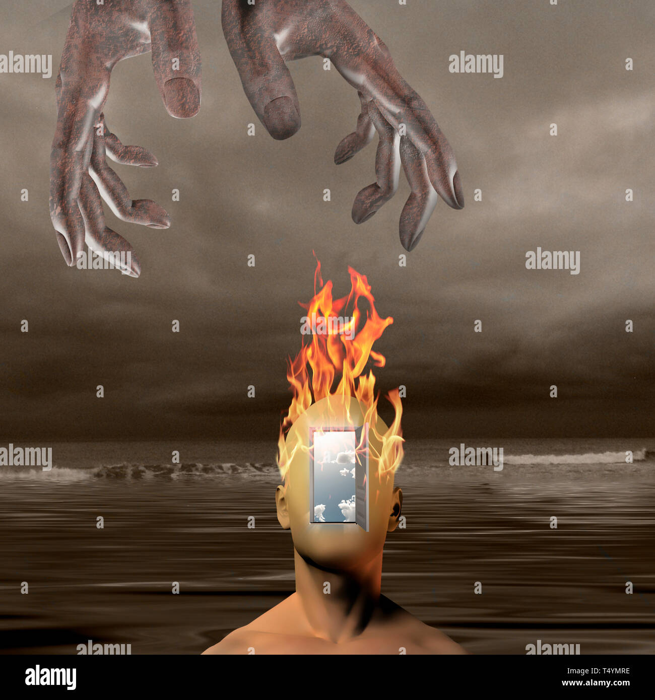 Burning human head with dark sea background Stock Photo - Alamy