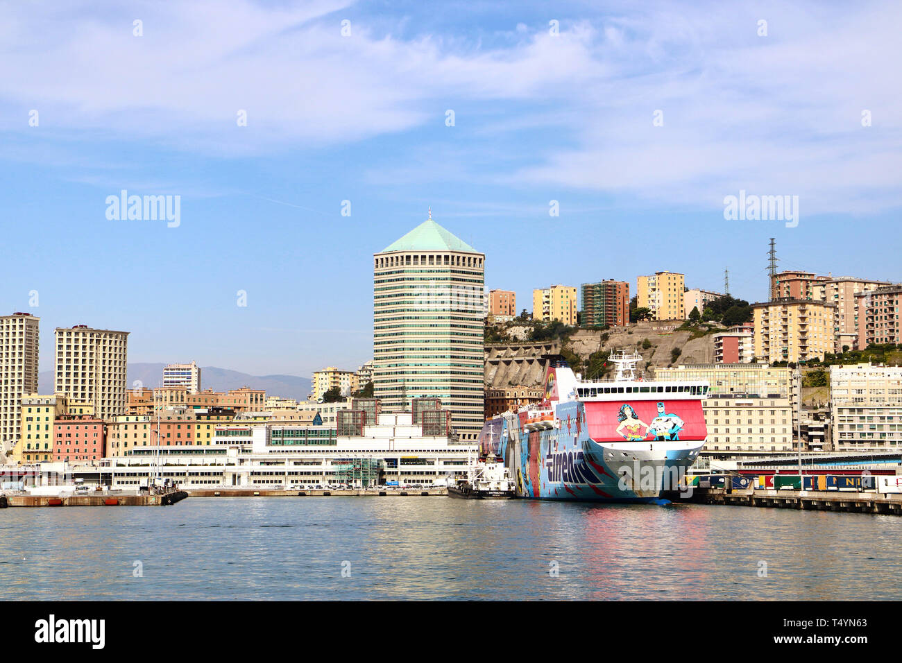 GENOA, ITALY - Genoa harbor with the ferry terminal and the view of the ...