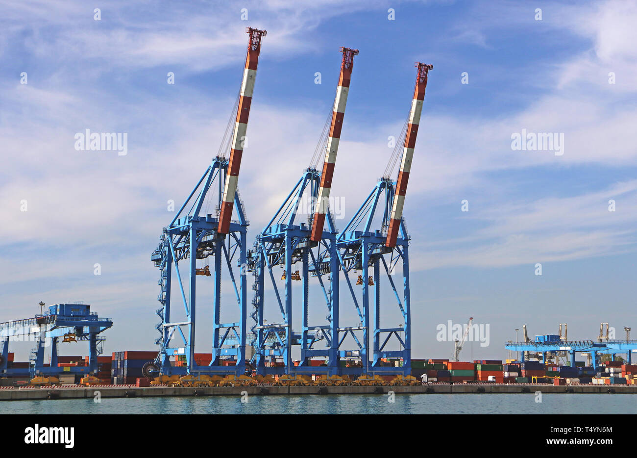 Genoa harbor: cranes and container port Stock Photo - Alamy