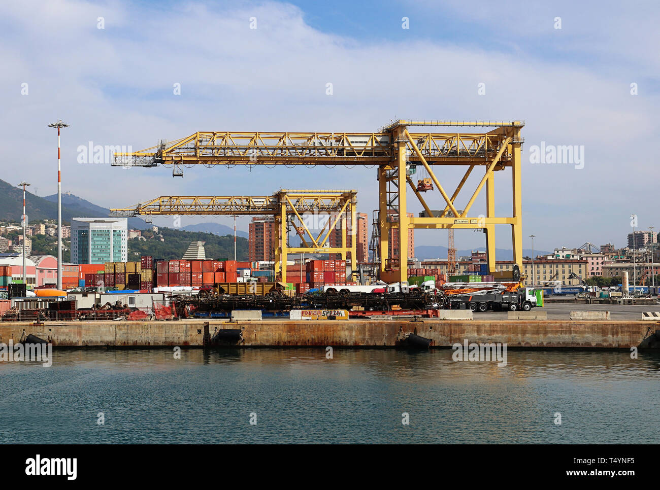 GENOA, ITALY - Cranes and the container terminal of the Genoa harbor ...