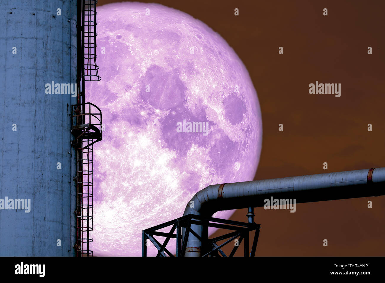 super cold moon back over silhouette refinery oil tank, Elements of ...