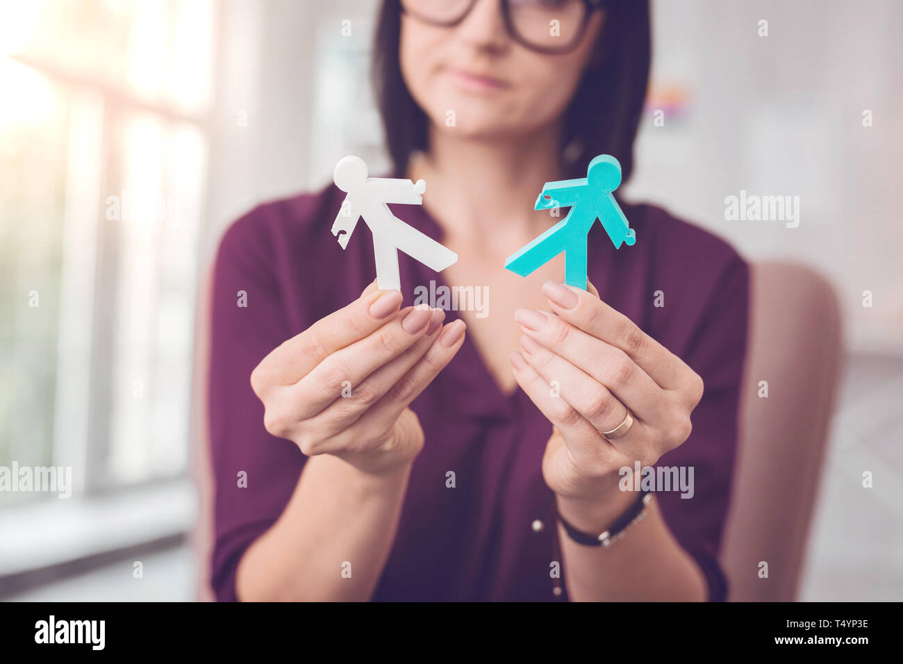 Close-up of human stick figures being hold in female hands Stock Photo ...