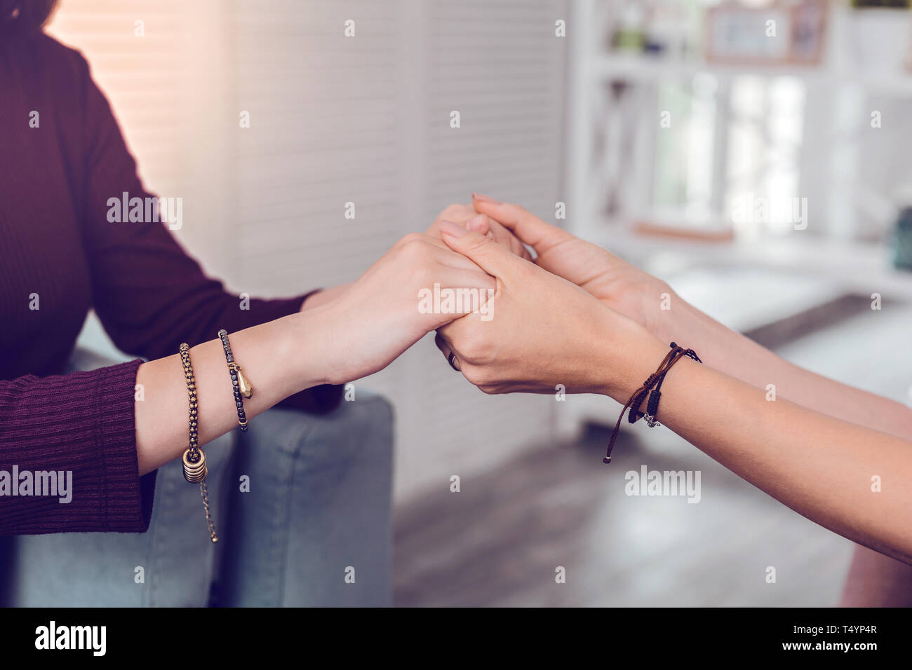 Close-up shot of two female delicate hands being hold Stock Photo - Alamy