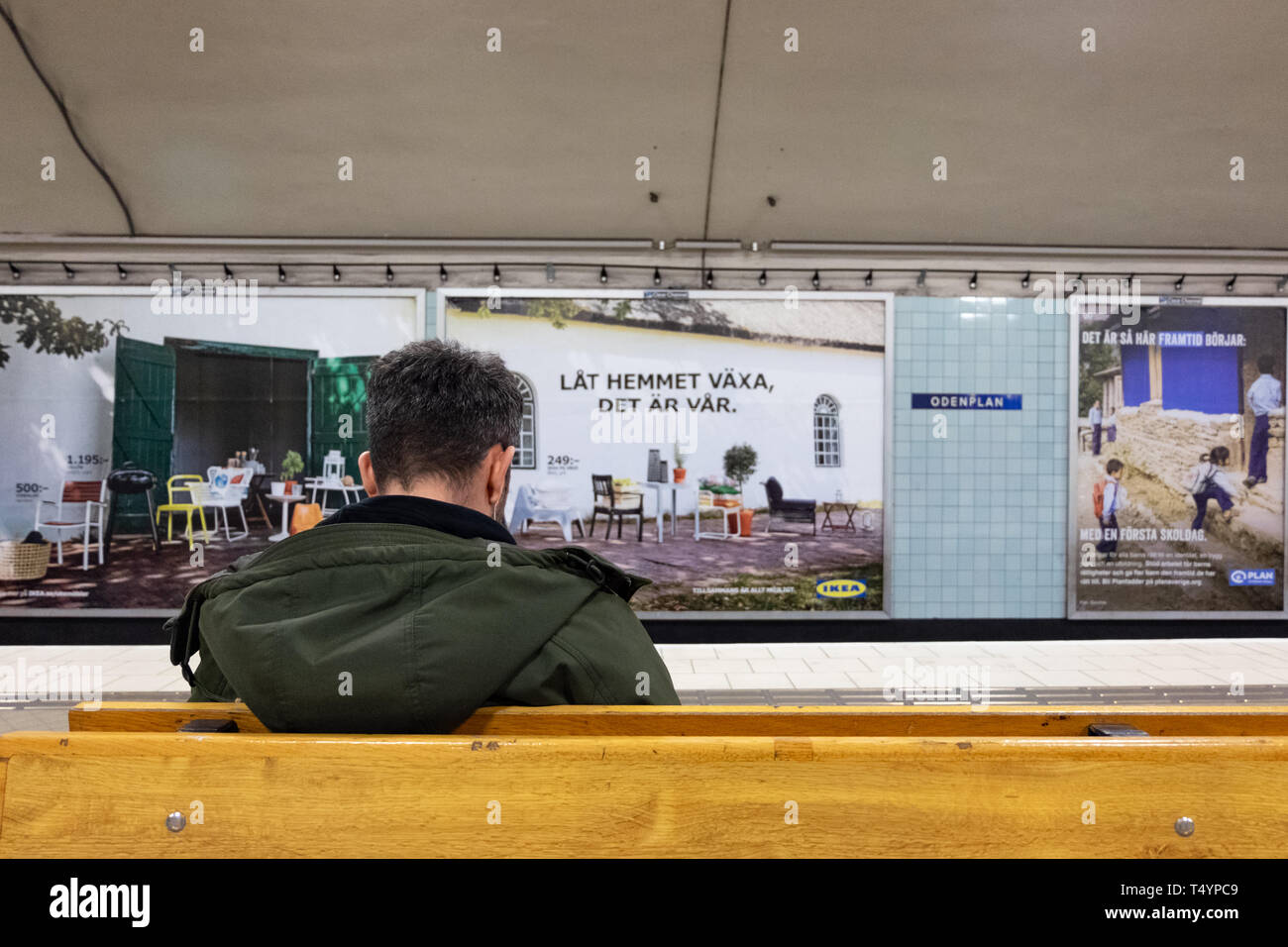 Man sits bench subway station hi-res stock photography and images - Alamy
