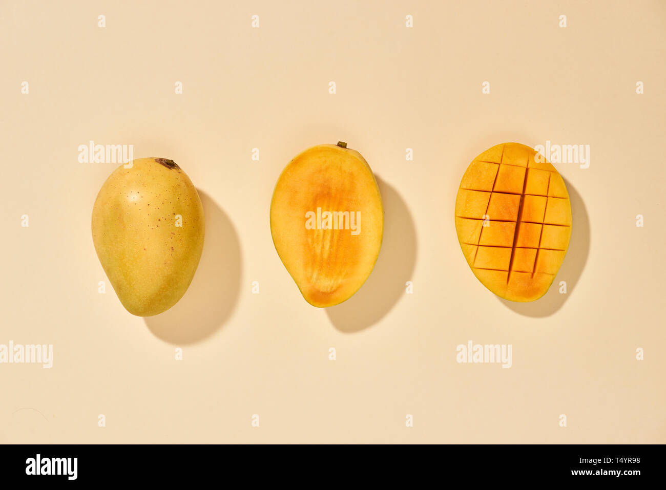 Fresh and beautiful mango fruit with sliced diced mango chunks on ...