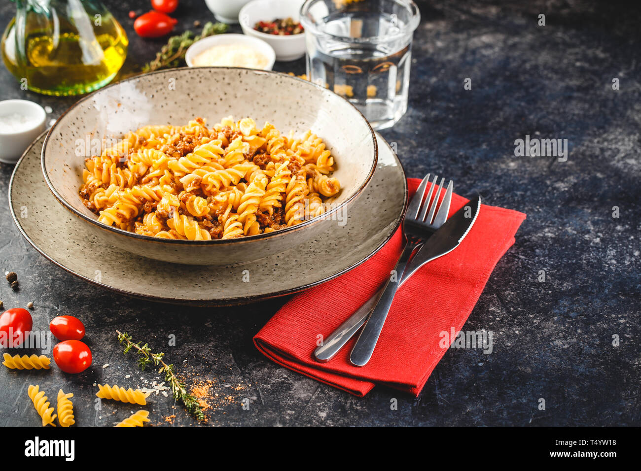 Pasta fusilli with bolognese tomato beef sauce. Traditional italian ...