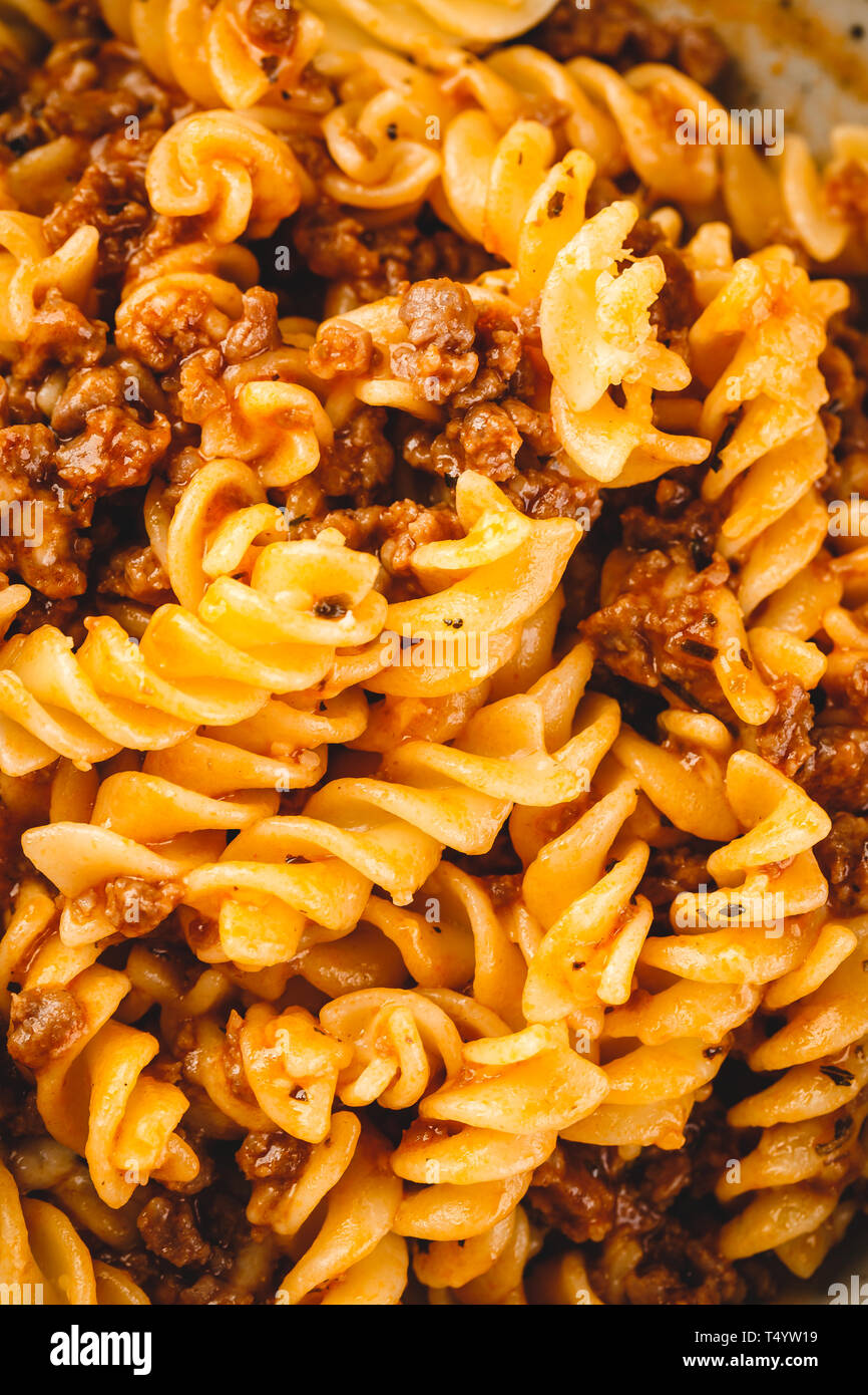 Pasta fusilli with bolognese tomato beef sauce. Traditional italian ...