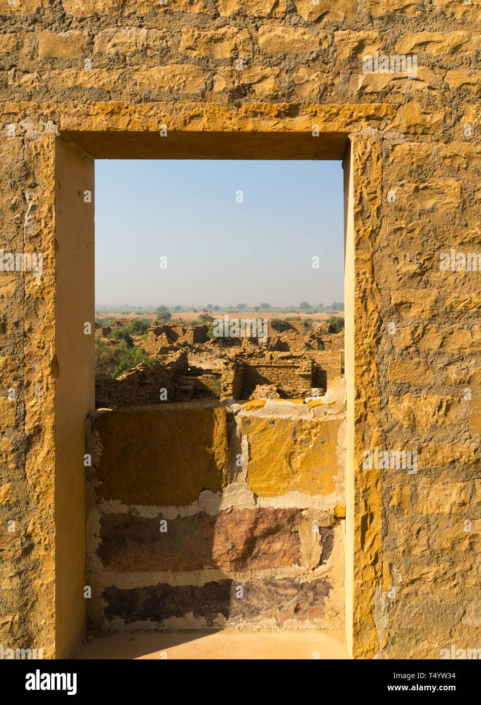Ruined stone gateway leading to the haunted ruins of Kumbalgarh ...