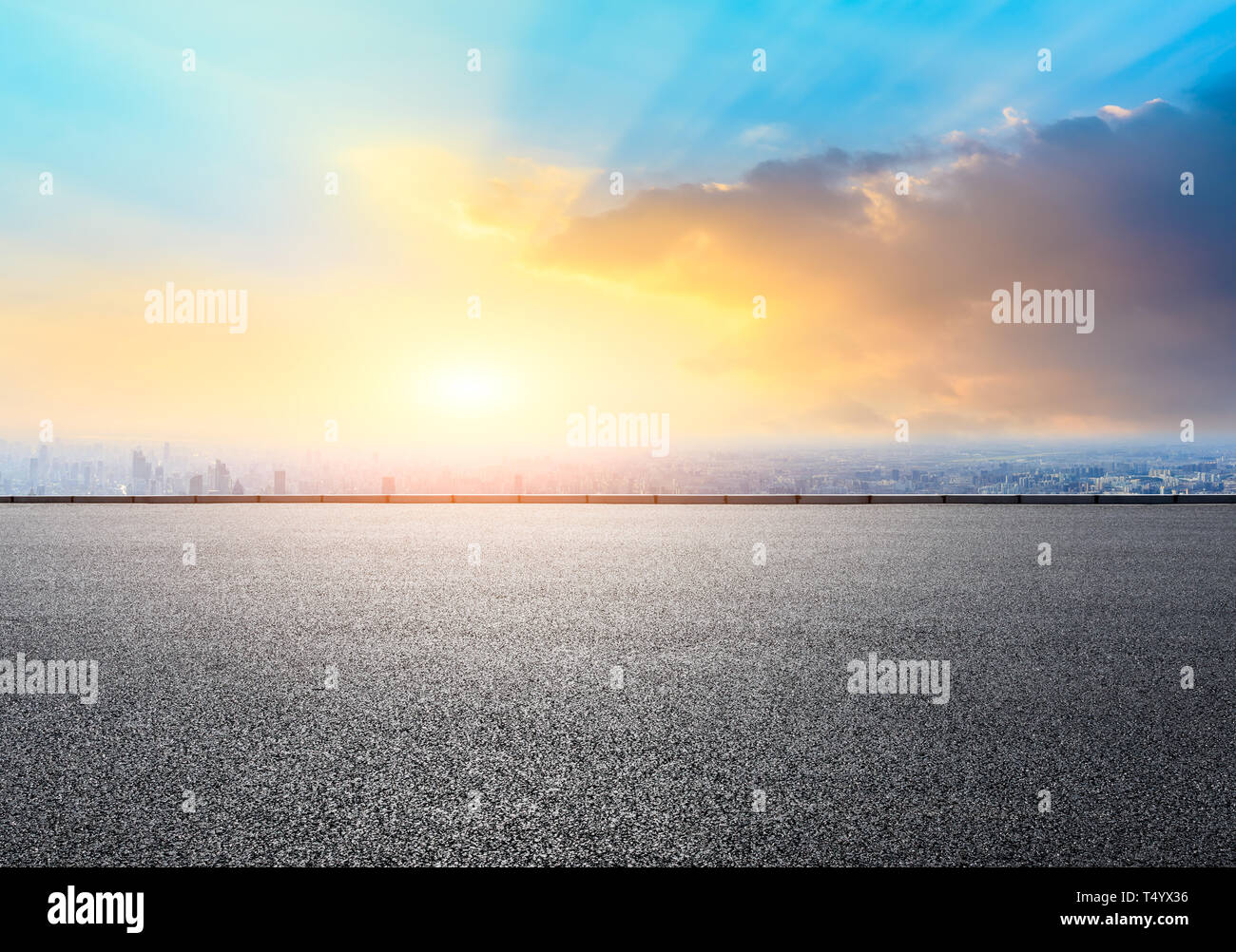 Shanghai city skyline and empty asphalt road ground scenery at sunrise ...