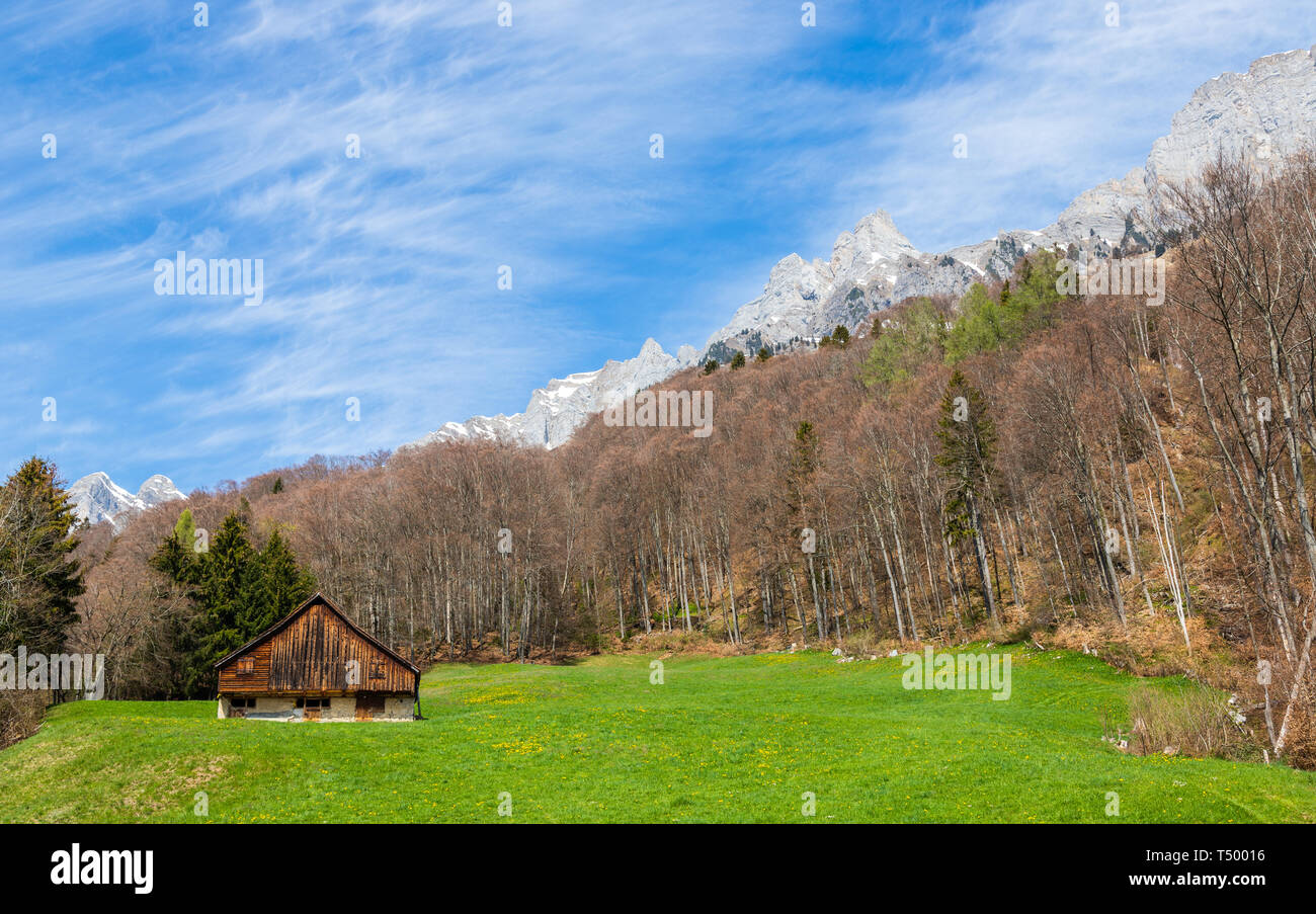 Old barn in the Alps in the early spring Stock Photo - Alamy